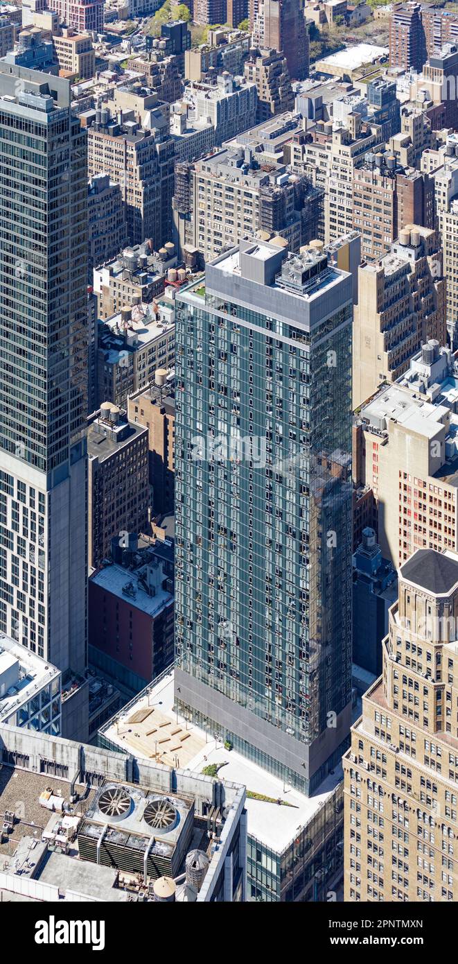 Floor-to-ceiling windows form the glass-striped façade of EOS, a ...