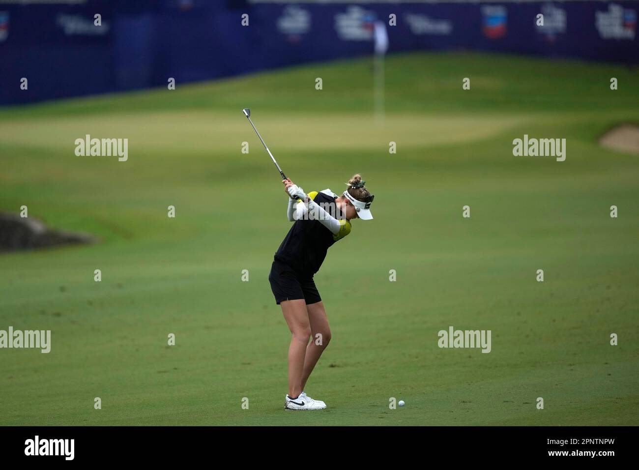 Nelly Korda hits her approach shot to the 18th green during the first ...