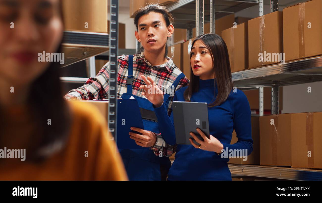 Team people organizing products on hi-res stock photography and images ...