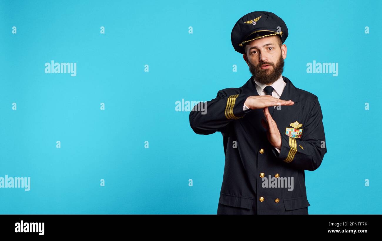 Commercial pilot doing t shape gesture on camera, asking for break and ...