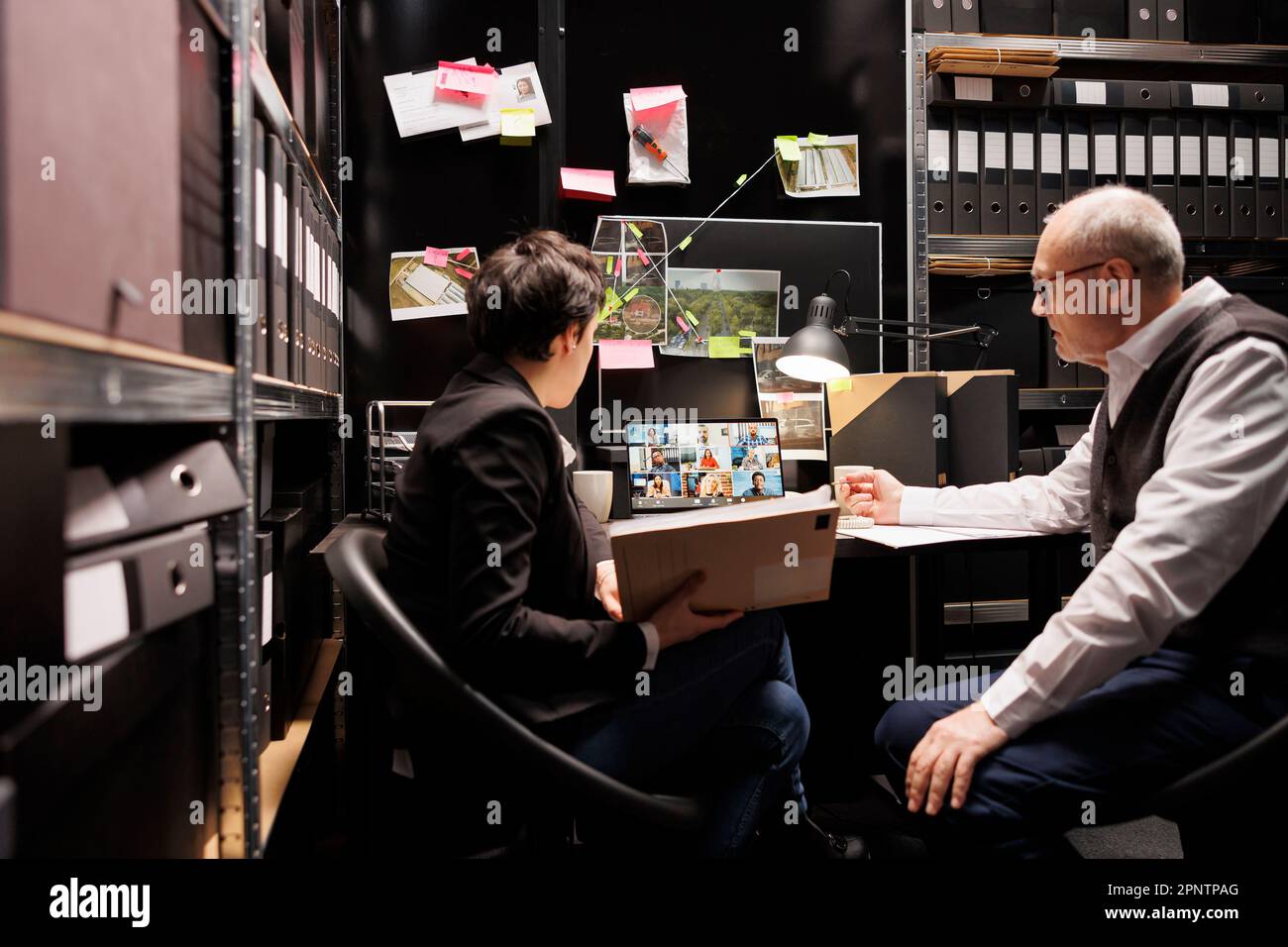 Police officers having online videocall with remote team, discussing ...