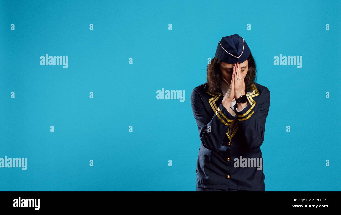 Happy woman dressed as stewardess clapping hands, applauding something ...