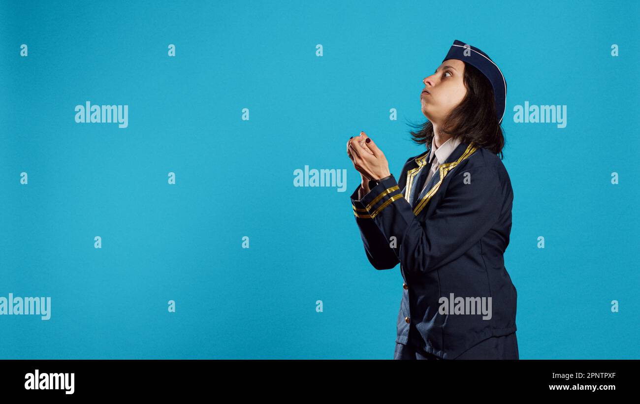 Young adult dressed as air hostess applauding, clapping hands and ...