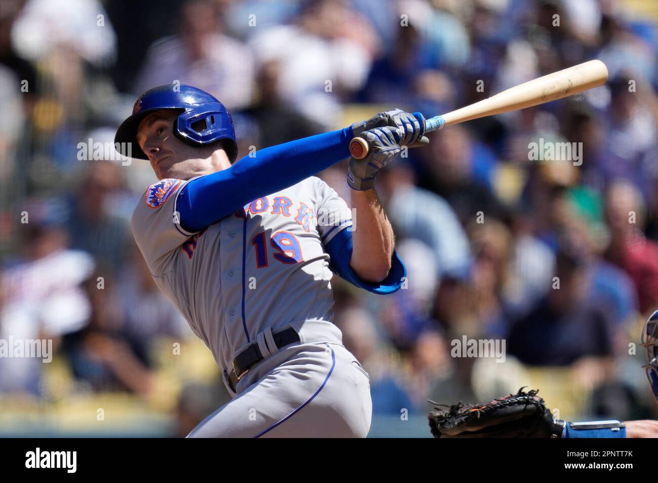 New York Mets' Mark Canha (19) follows through on a swing during a ...