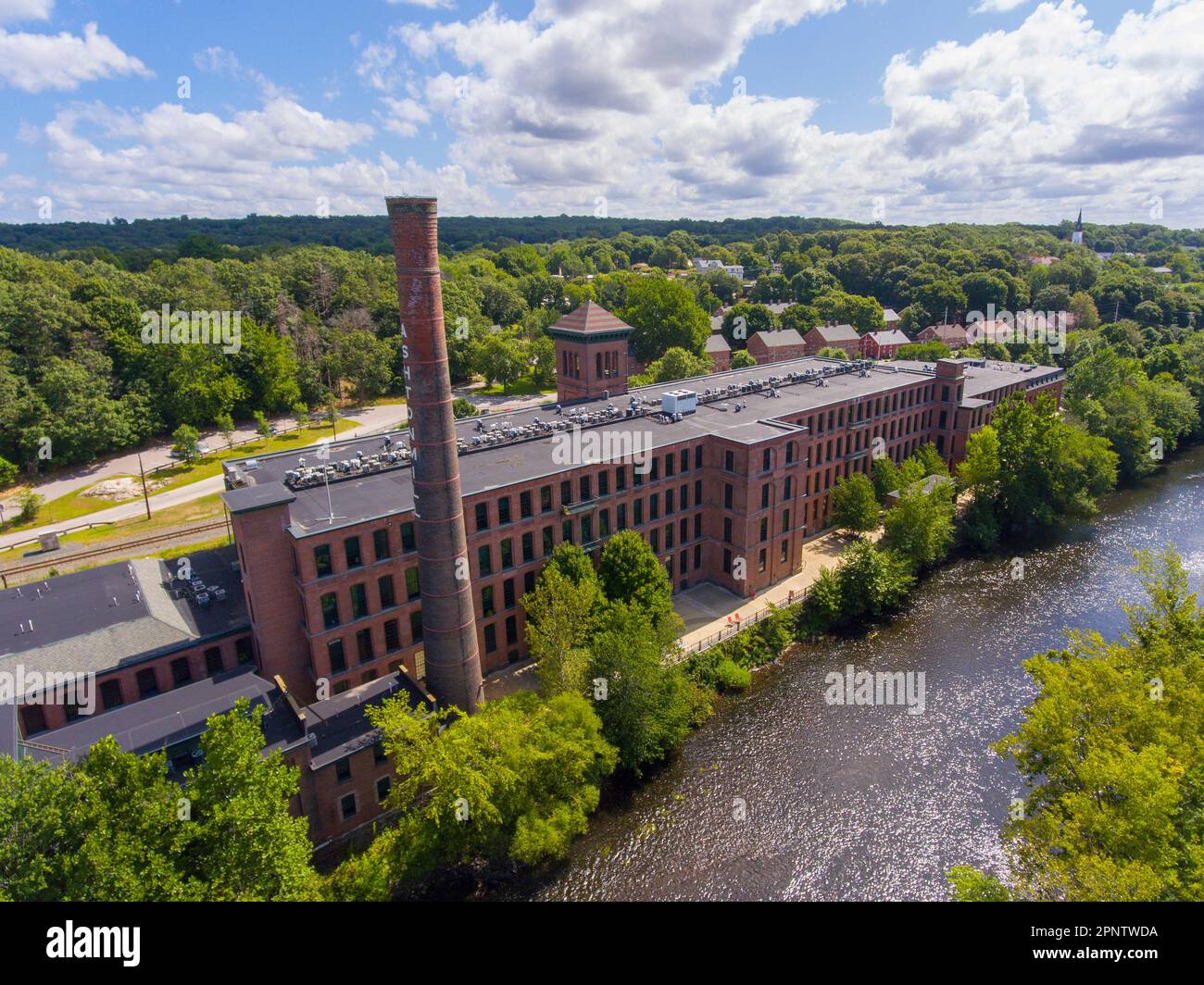 Ashton Mill aerial view at Blackstone River in historic town of ...