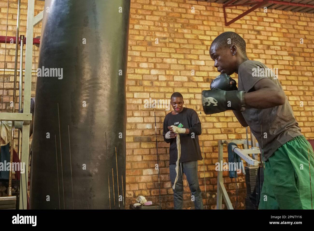 Romeo Msipha, 14, trains for a competition at a boxing club in Victoria ...