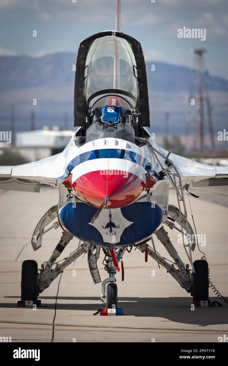 A US Air Force F-16 Falcon with the Thunderbirds sits on the tarmac at ...