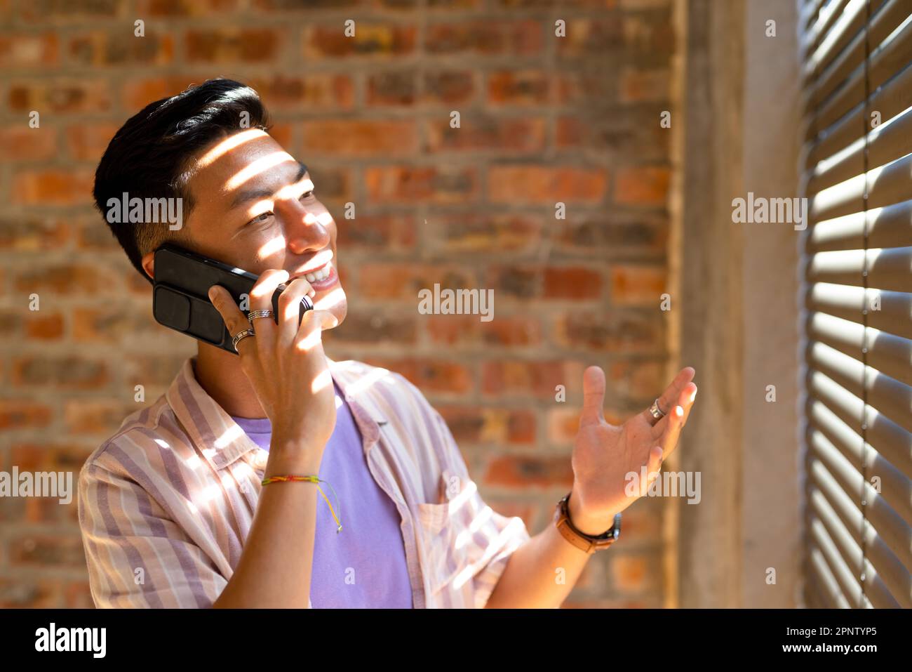 Happy businessman gesturing talking hi-res stock photography and images ...
