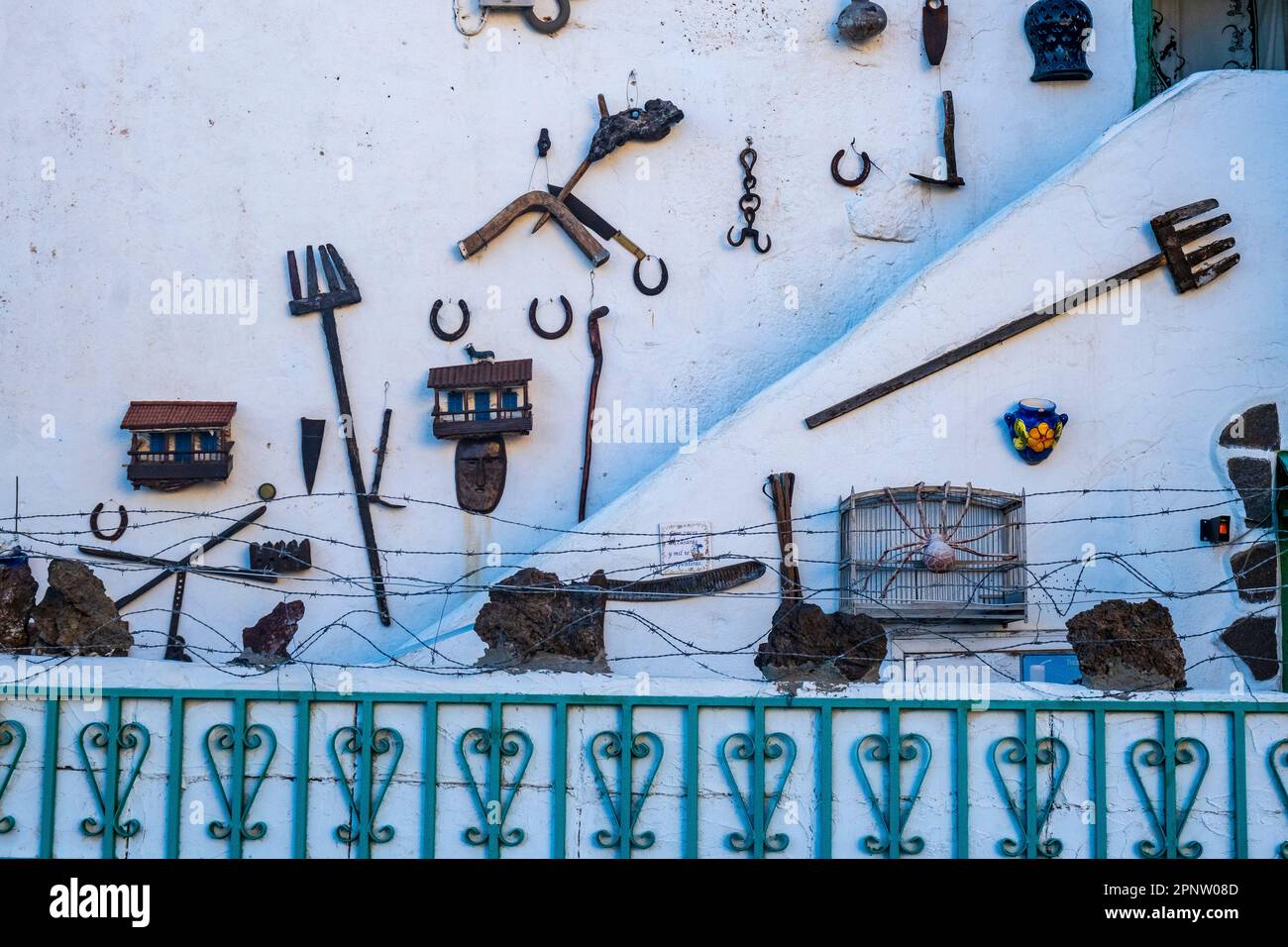 Tenerife, Canary Islands, Spain - old farm tools on a white wall Stock ...
