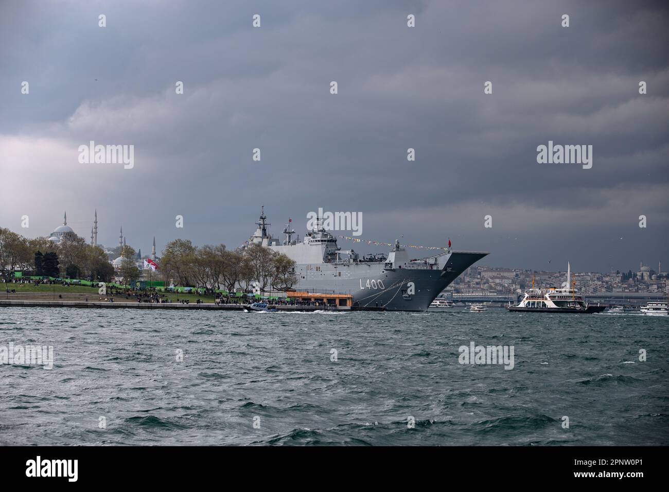 TCG Anadolu, anchored at Sarayburnu Port, hosts visitors. Long queues ...