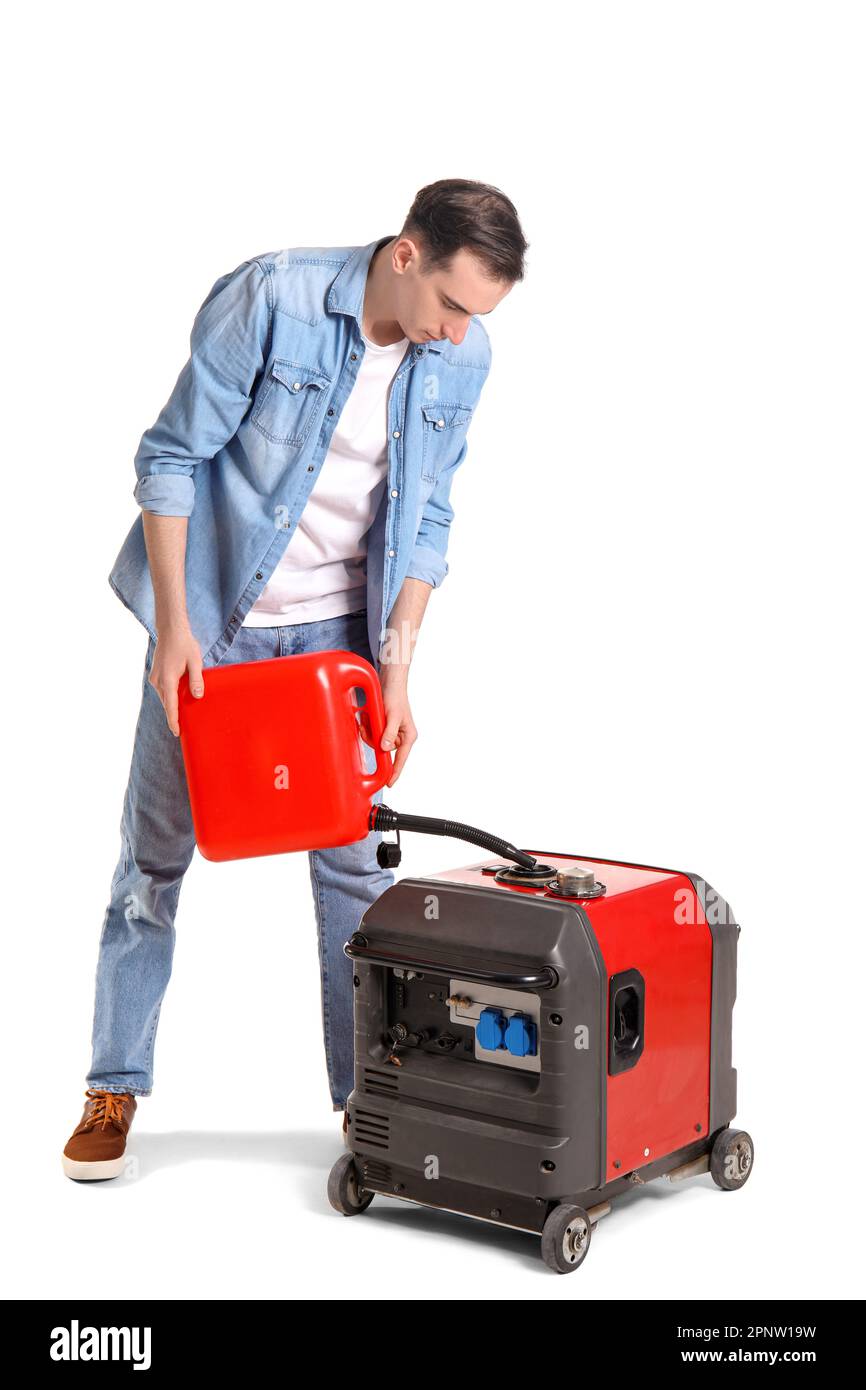 Young man with canister and portable gasoline generator on white ...