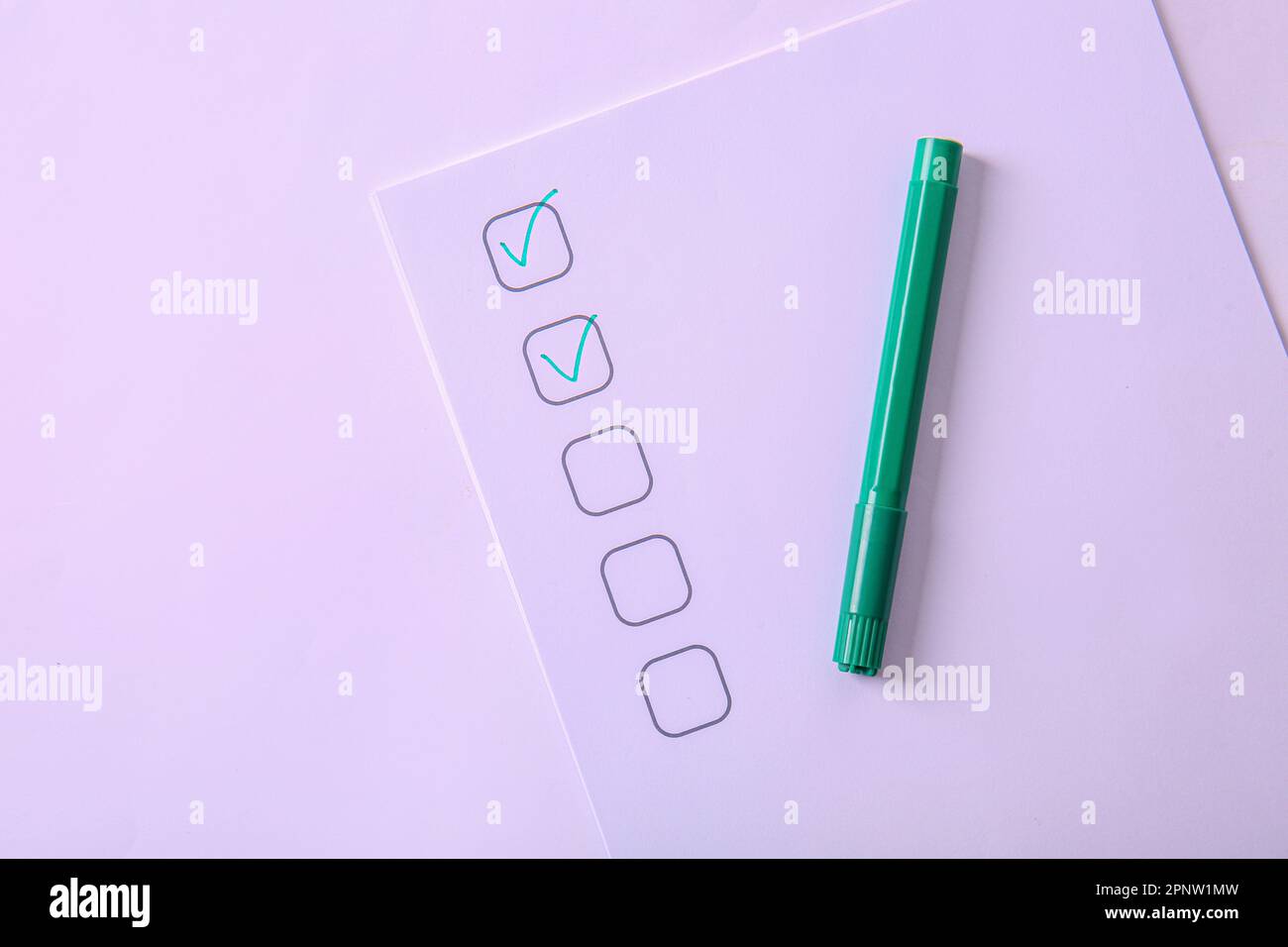 Checklist box with green marks and marker on white background Stock ...