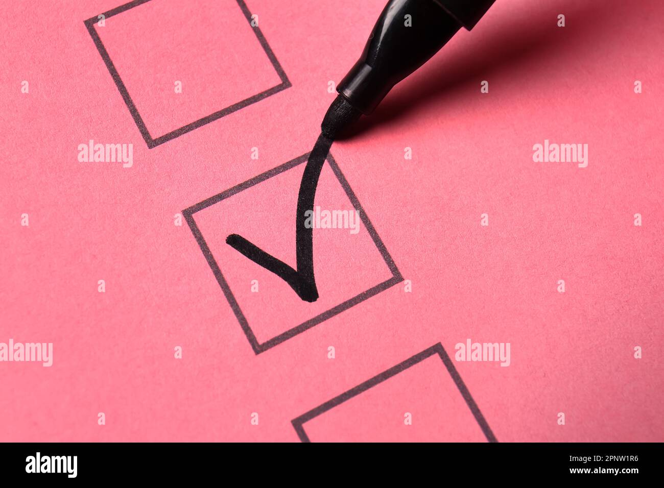 Black pen marking on checklist box, closeup Stock Photo - Alamy
