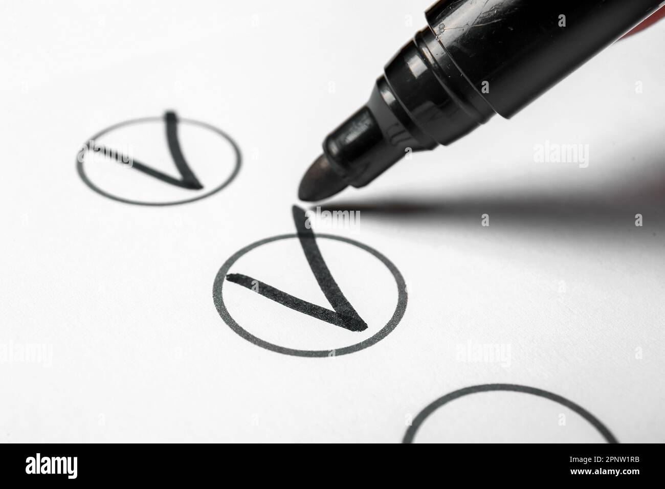 Black pen marking on checklist box, closeup Stock Photo - Alamy
