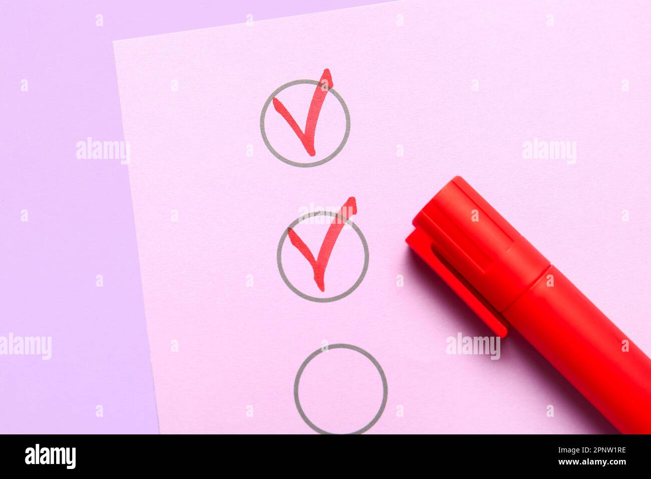 Checklist box with red marker, closeup Stock Photo - Alamy