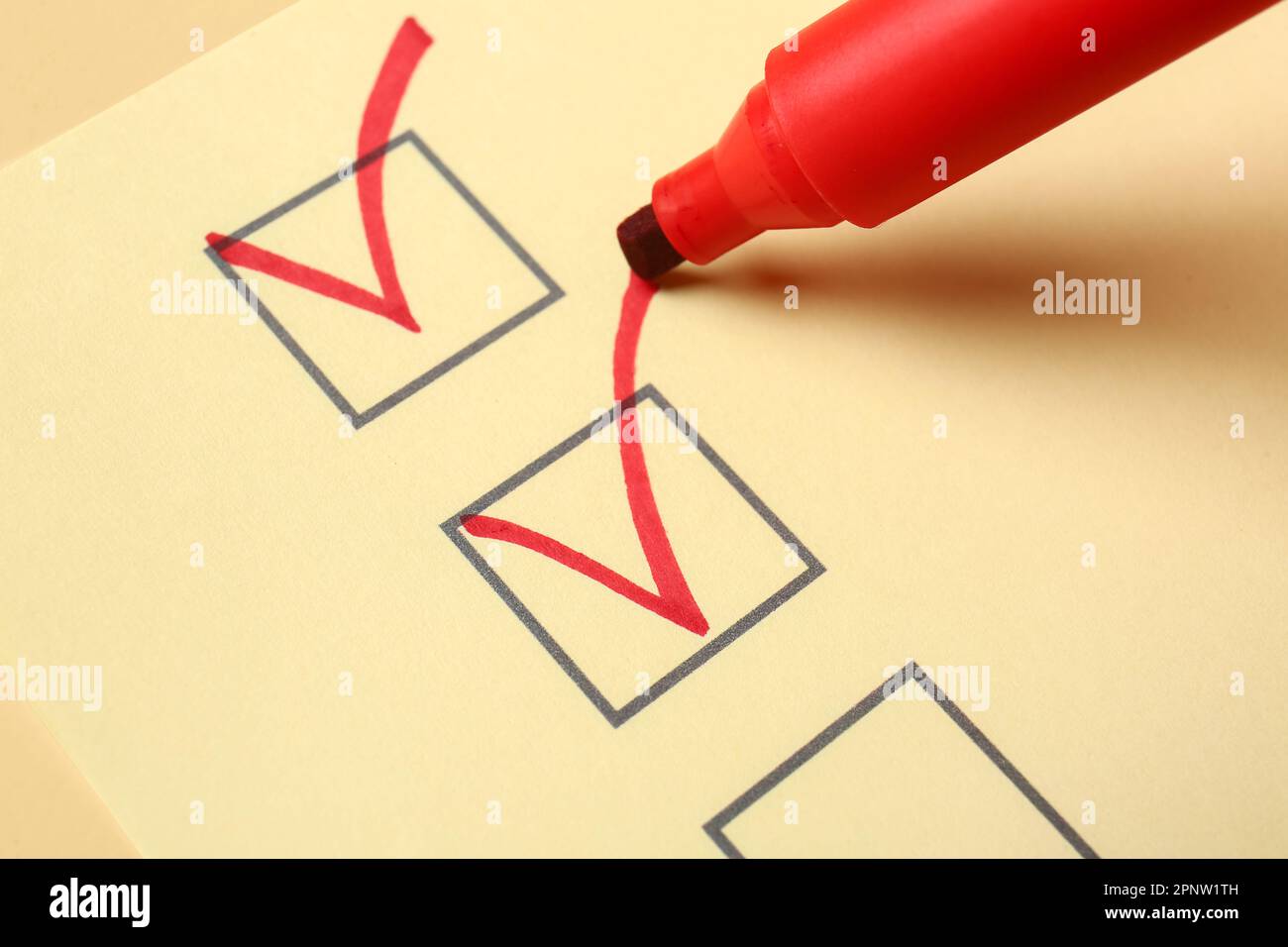 Red pen marking on checklist box, closeup Stock Photo - Alamy