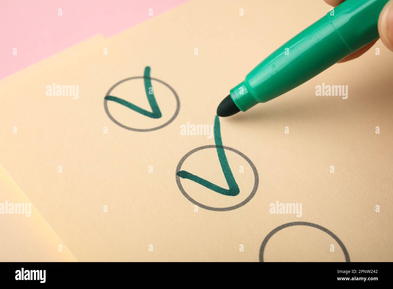 Green pen marking on checklist box, closeup Stock Photo - Alamy