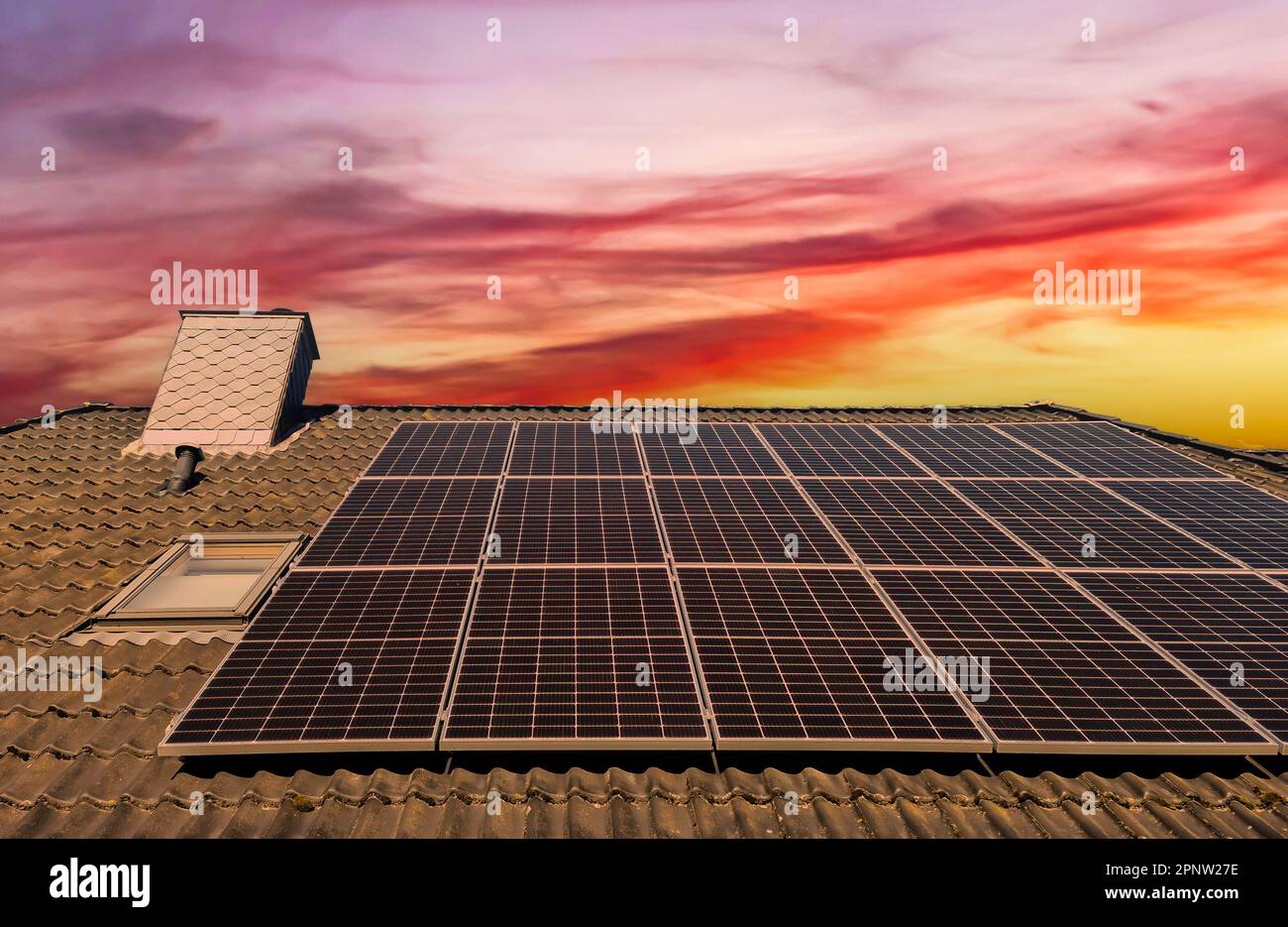 Solar panels producing clean energy on a roof of a residential house ...