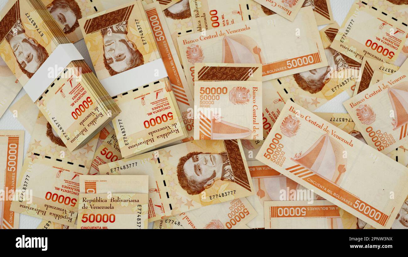 3D rendering of Venezuelan bolivar notes spread on surface Stock Photo ...