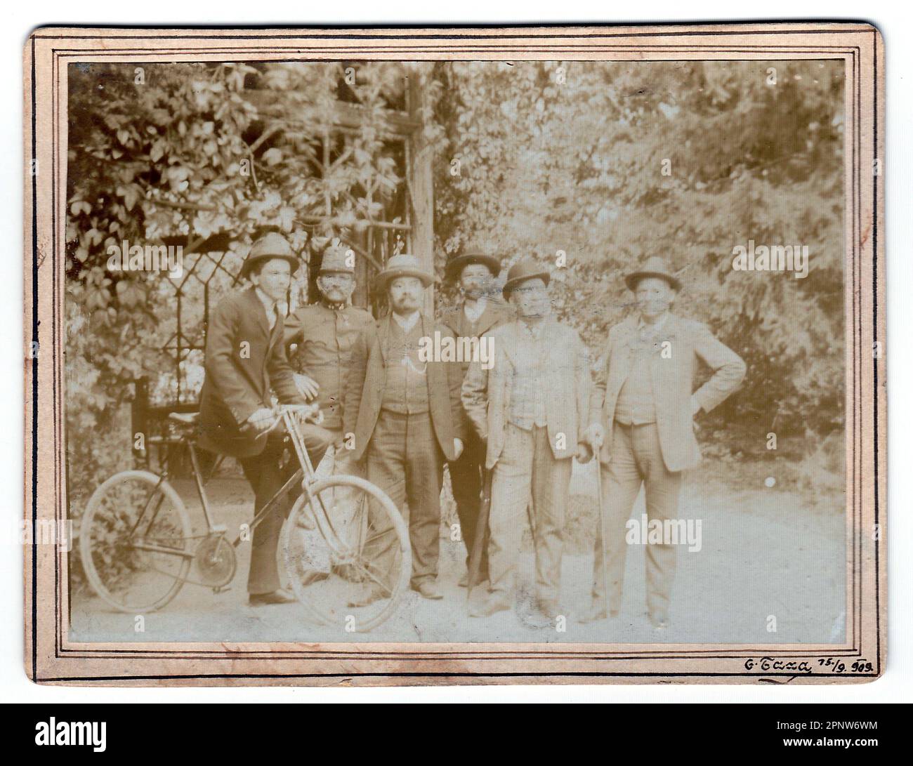 AUSTRIA-HUNGARY, SEPTEMBER 15, 1909: Vintage photo shows men in nature ...