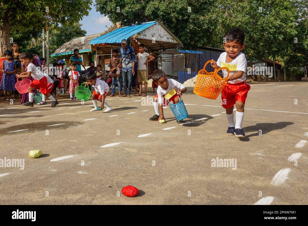 Thayaparan Savithiran, 4, right, and his classmates, from left ...