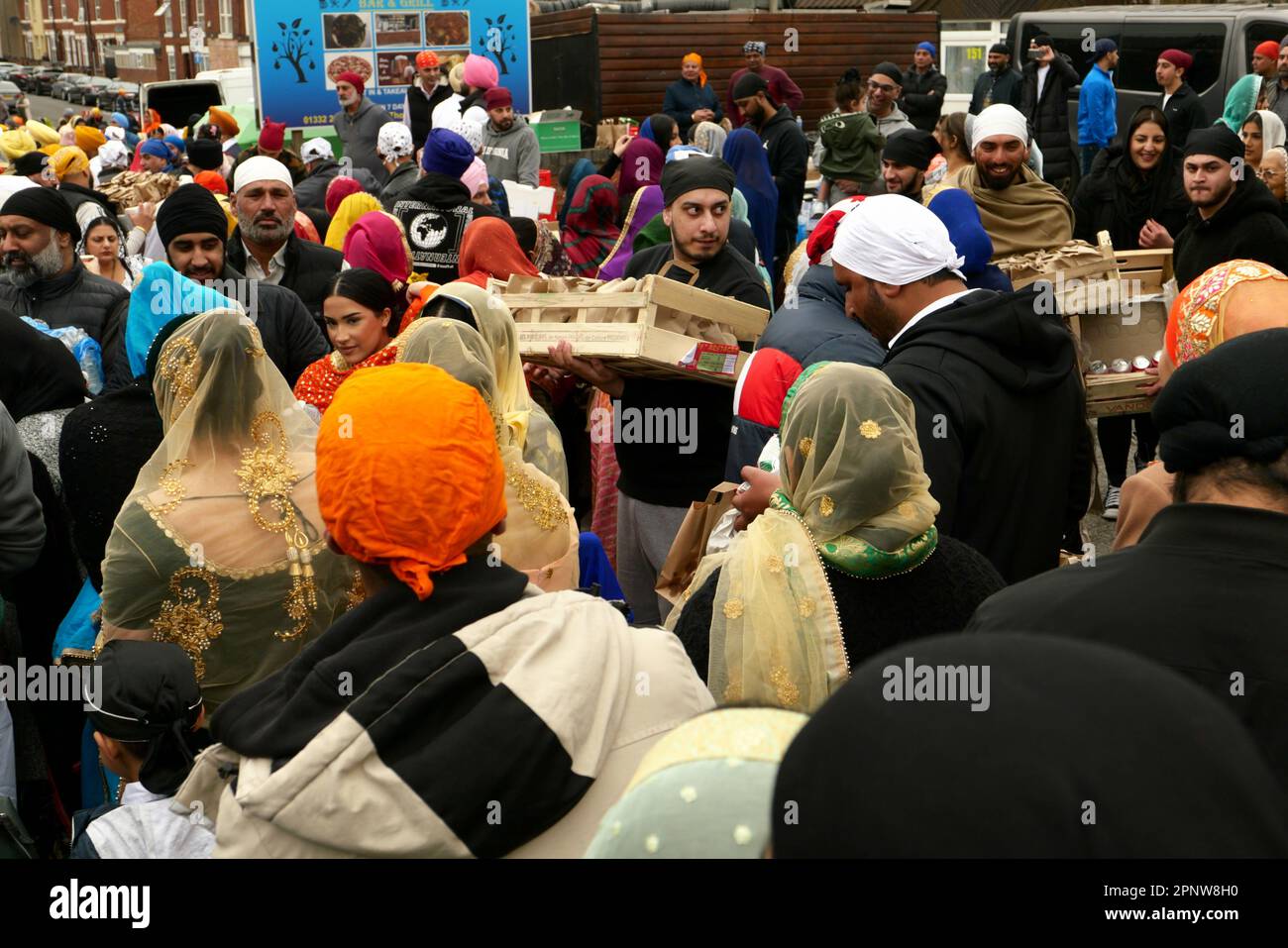 Free food being given to the crowd at one of many such points during ...