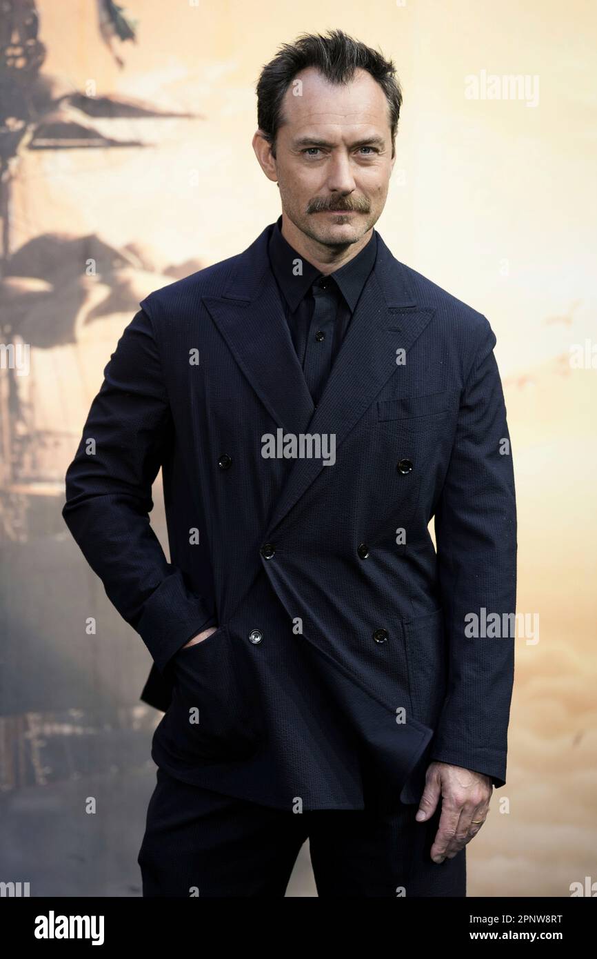 Jude Law poses for photographers upon arrival at the World premiere of ...