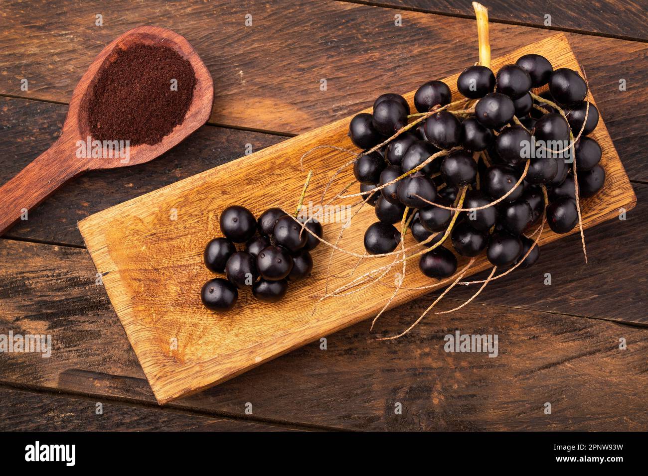 Amazonian acai berries and powder - Euterpe oleracea Stock Photo - Alamy