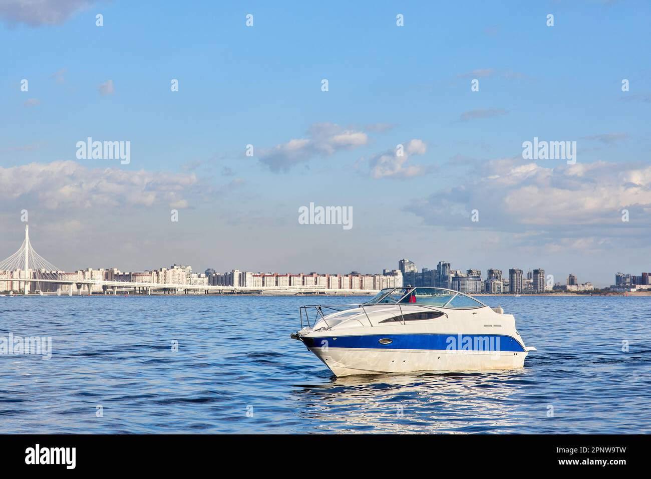 Photo of a boat sailing in the bay Stock Photo - Alamy