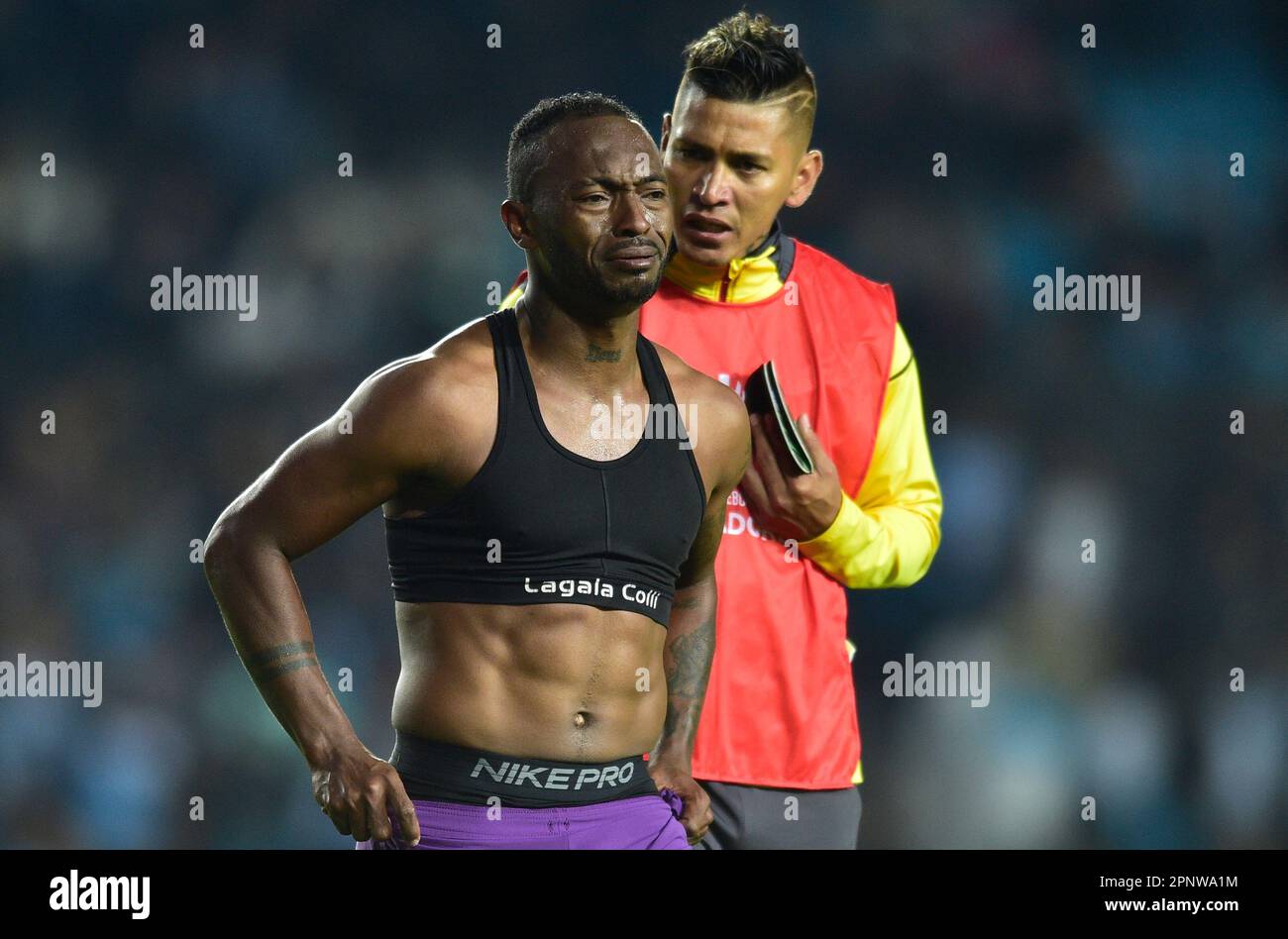 Pedro Perlaza of Ecuador's Aucas, left, cries after his team´s 3-2 loss ...