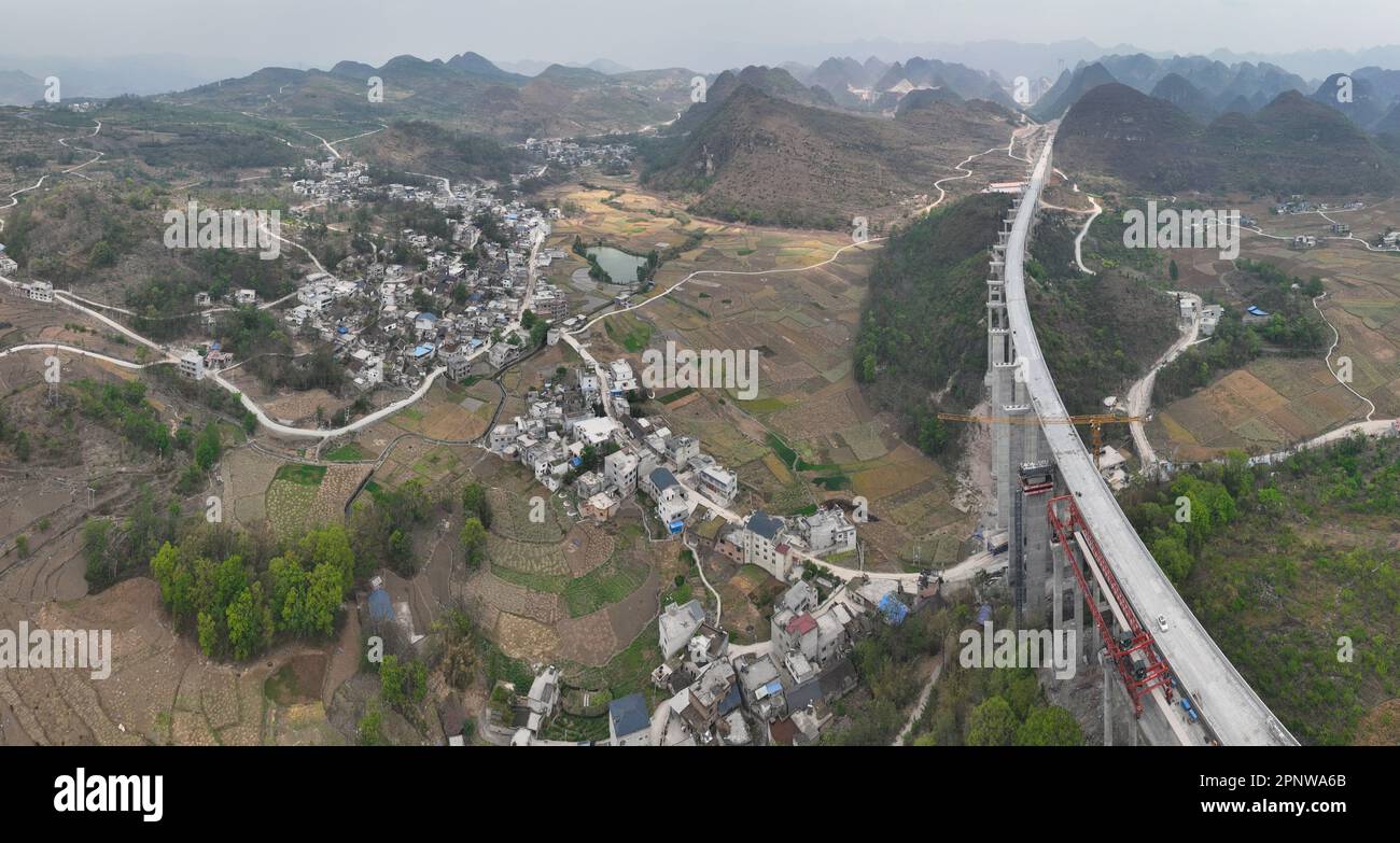 Aerial view of bridge and remote village in Guizhou, China Stock Photo ...