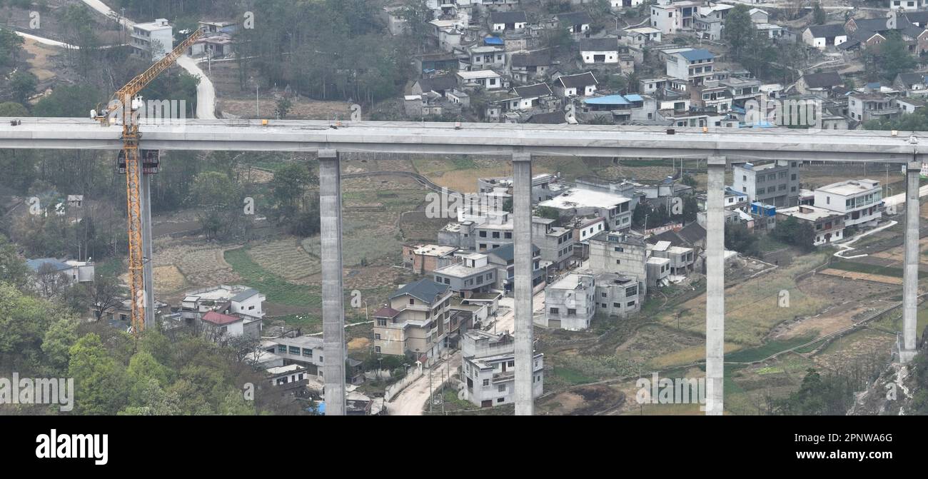 Aerial view of bridge and remote village in Guizhou, China Stock Photo ...