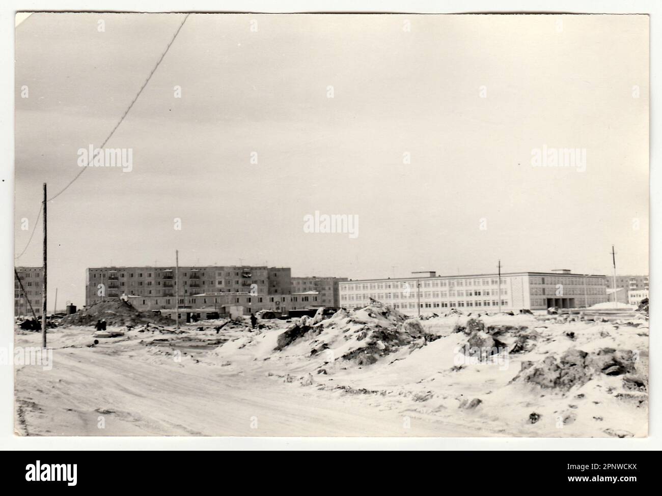Vintage photo shows construction of blocks of flats in USSR. Winter ...