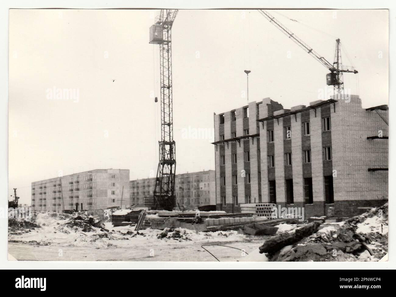 Vintage photo shows construction of blocks of flats in USSR. Winter ...