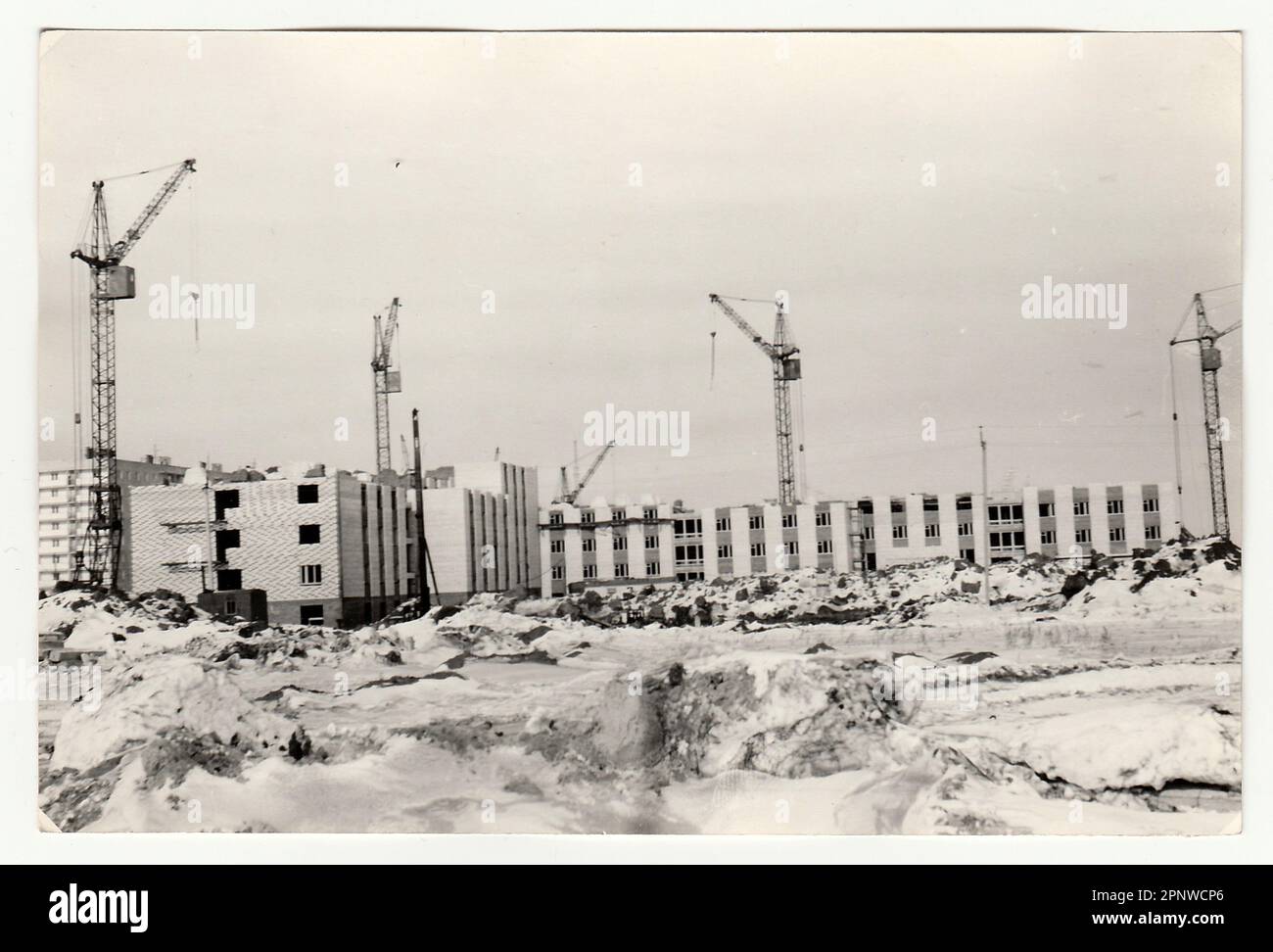 Vintage photo shows construction of blocks of flats in USSR. Winter ...