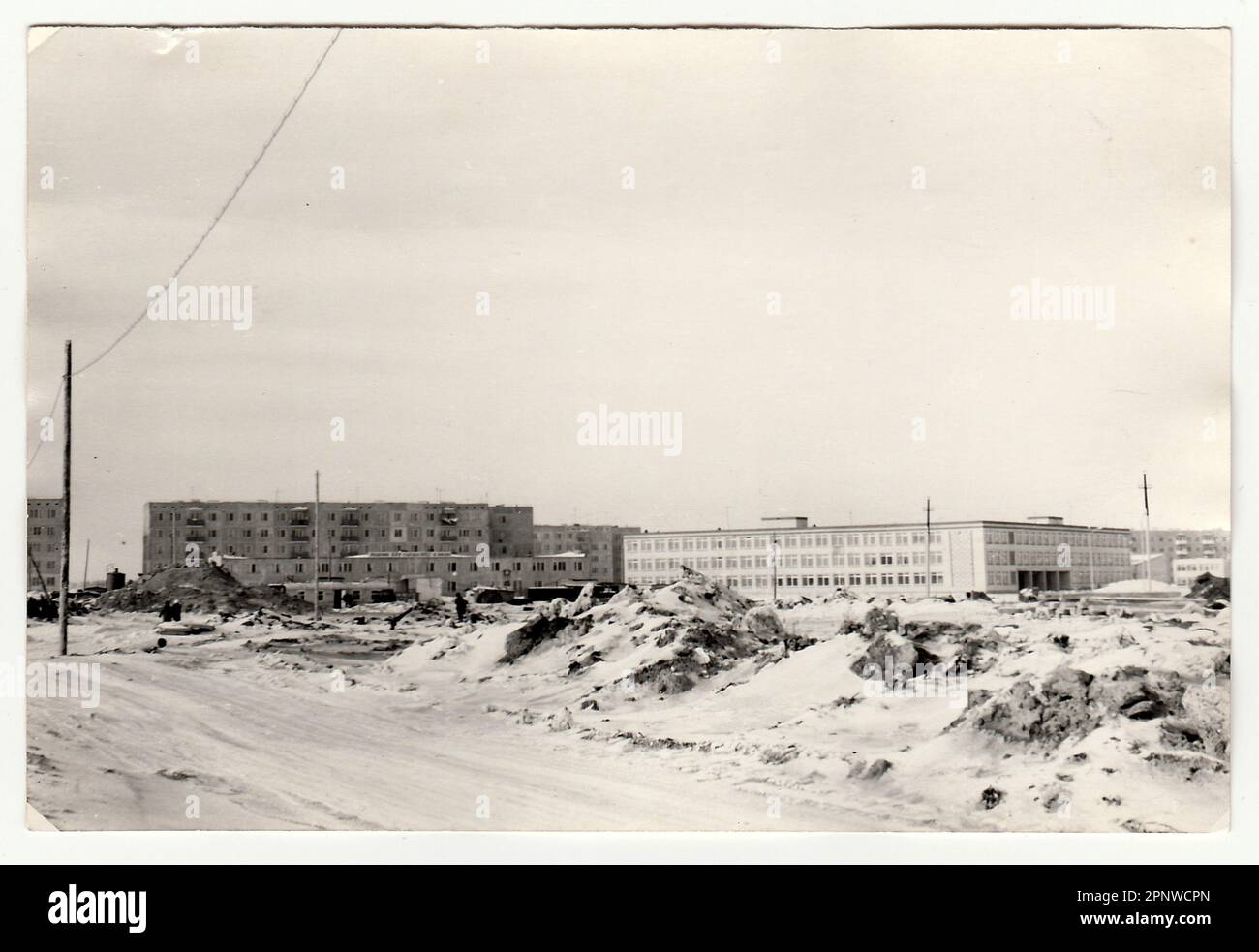 Vintage photo shows construction of blocks of flats in USSR. Winter ...