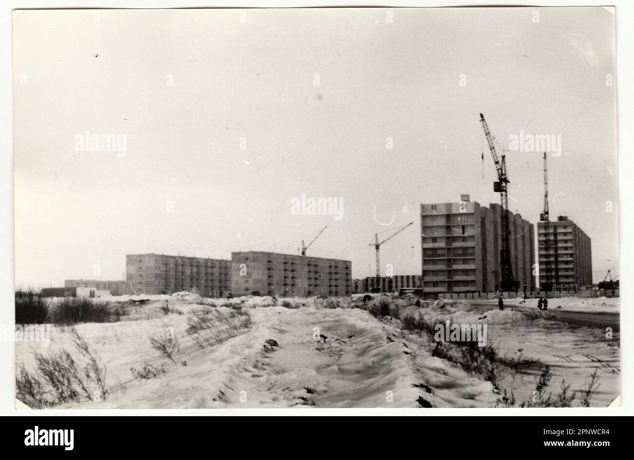 Vintage photo shows construction of blocks of flats in USSR. Winter ...