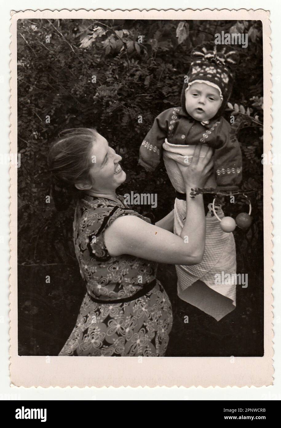 USSR - CIRCA 1970s: Vintage photo shows mother holds toddler with ...
