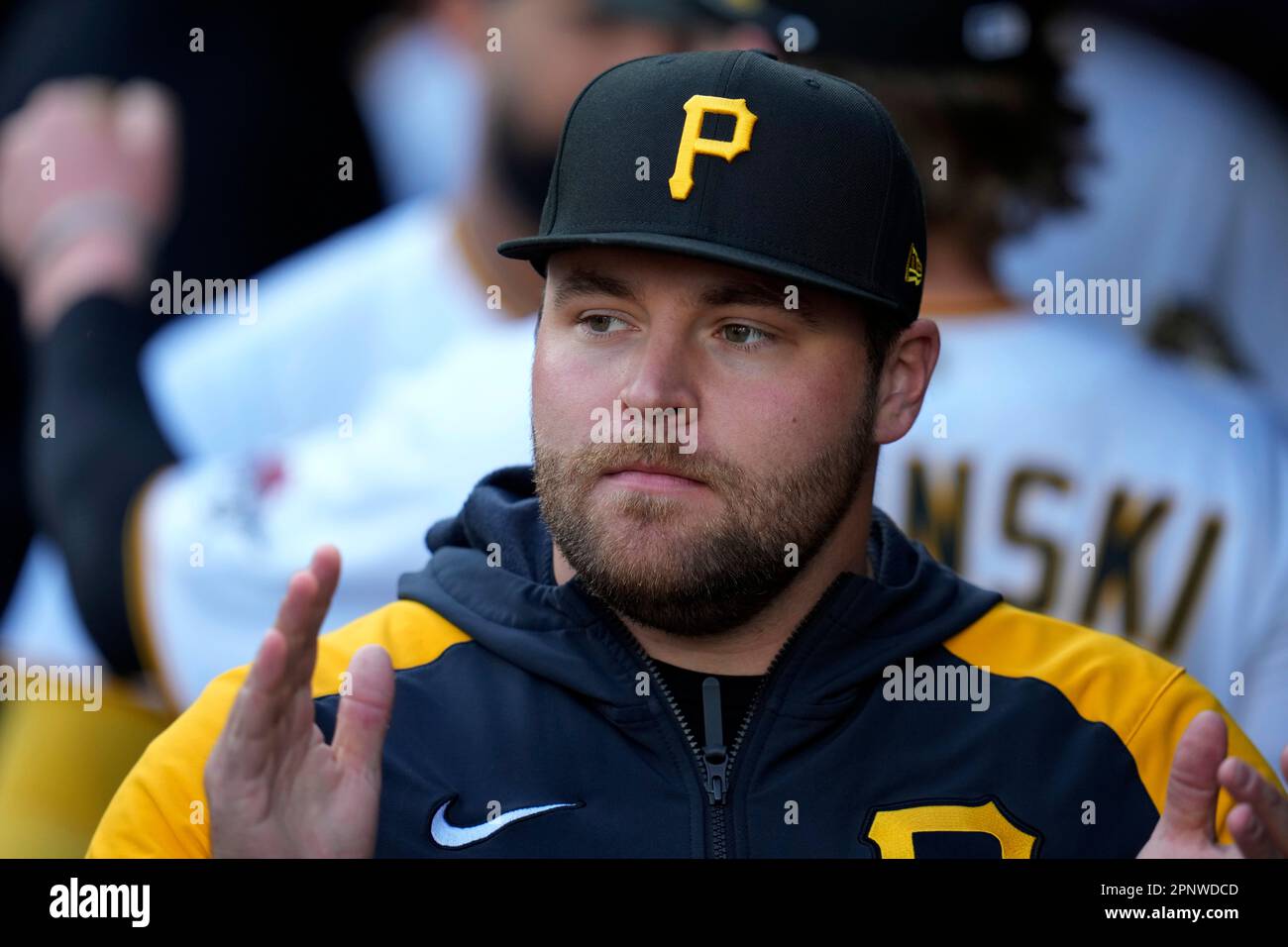 Pittsburgh Pirates relief pitcher David Bednar walks in the dugout ...