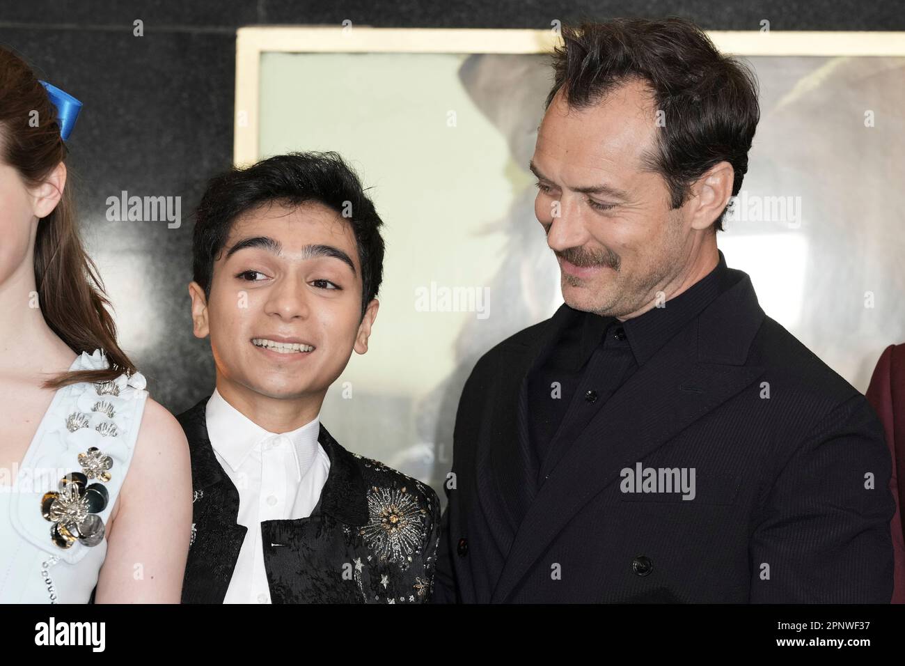 Alexander Molony, left, and Jude Law pose upon arrival at the premiere ...