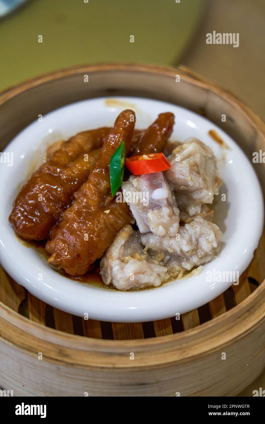 A delicious Cantonese morning tea dim sum, steamed chicken feet and ...