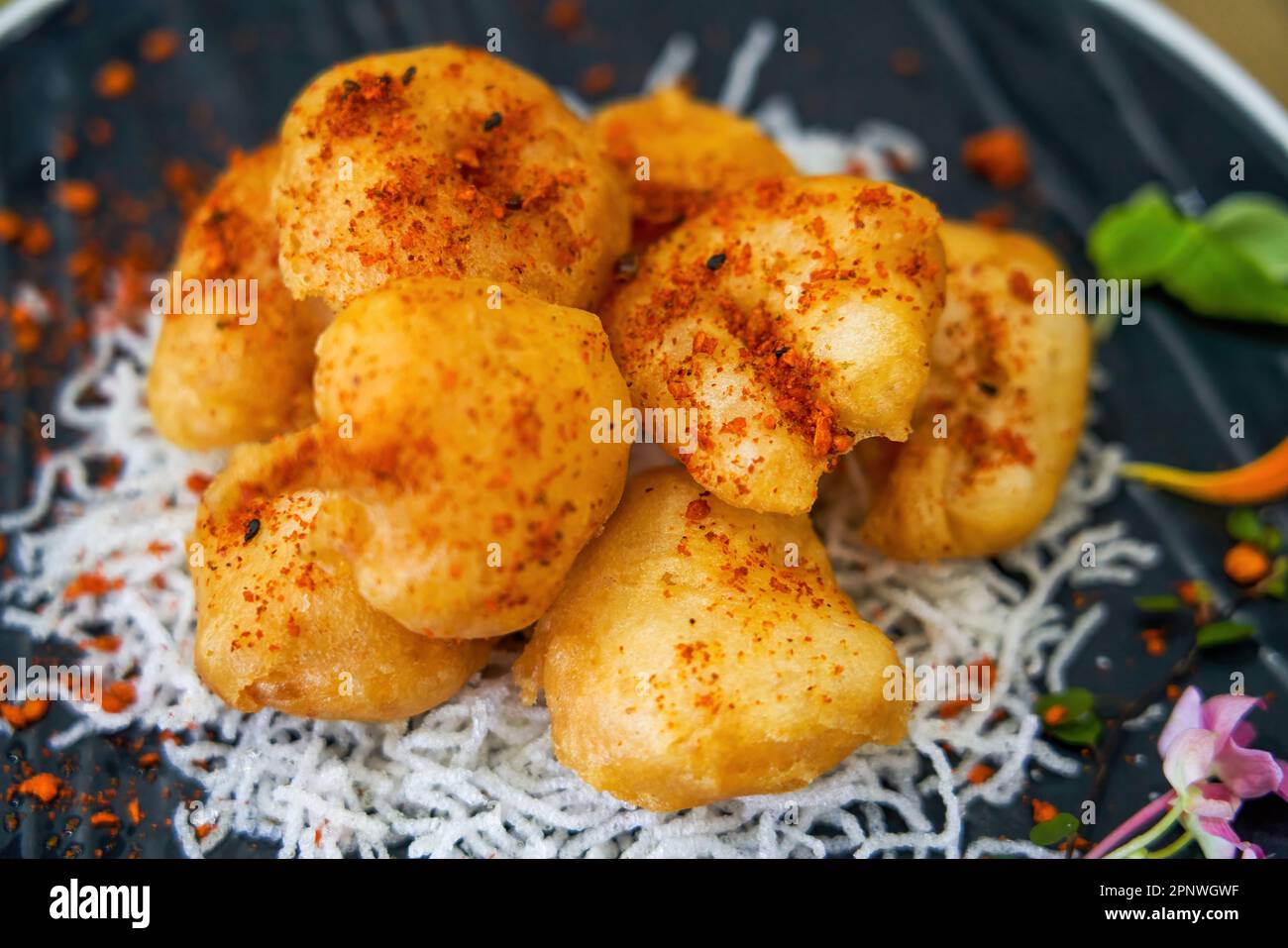 A plate of crispy and delicious fried shrimp balls Stock Photo - Alamy