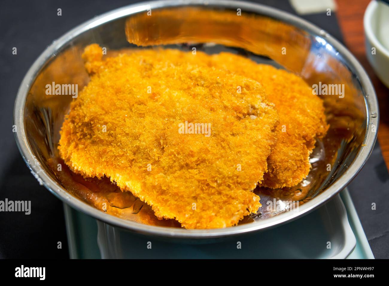 A crispy and tempting deep-fried chicken chop Stock Photo - Alamy
