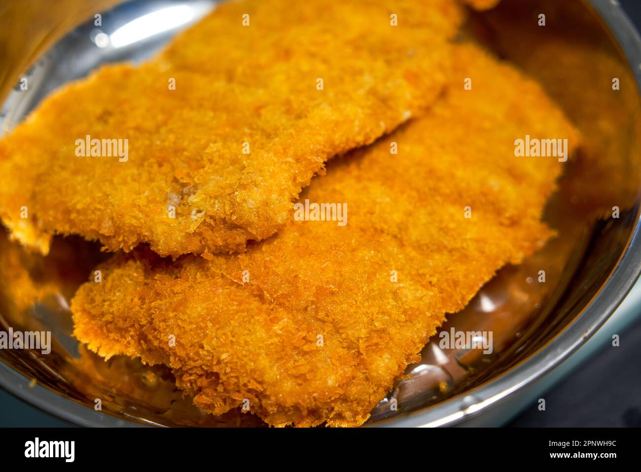 A crispy and tempting deep-fried chicken chop Stock Photo - Alamy