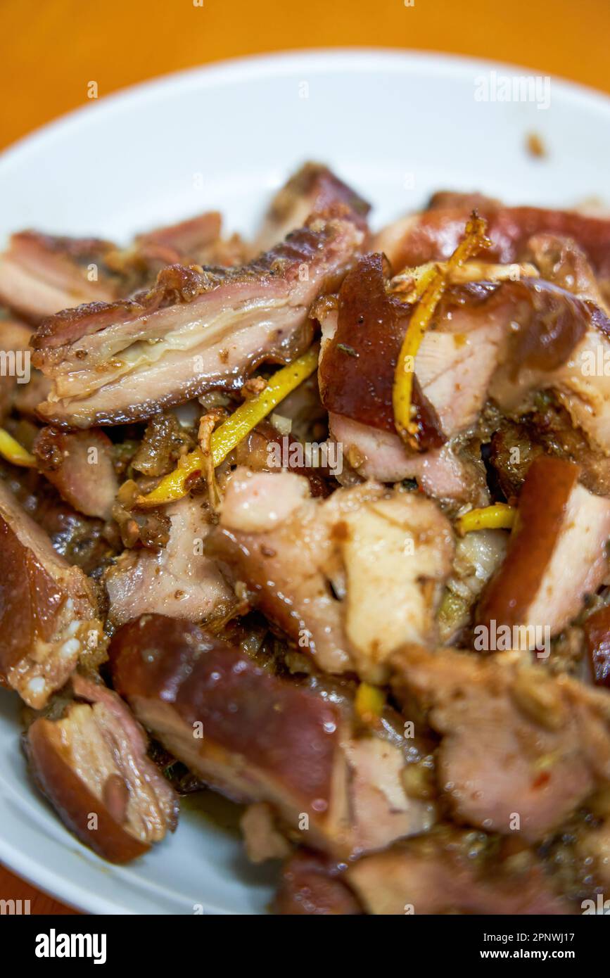 A plate of crispy and delicious fried roast pork Stock Photo - Alamy