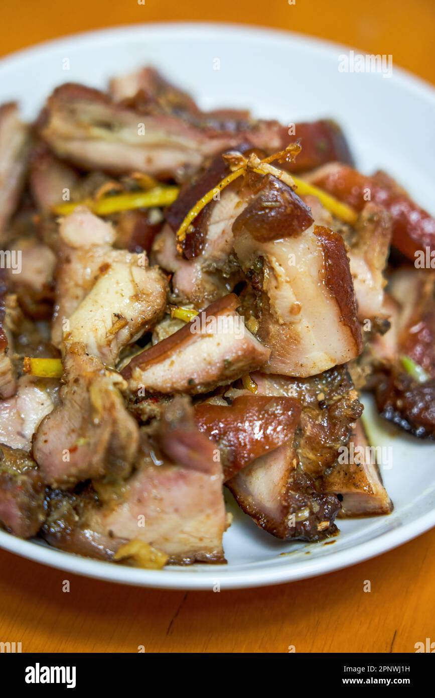 A plate of crispy and delicious fried roast pork Stock Photo - Alamy