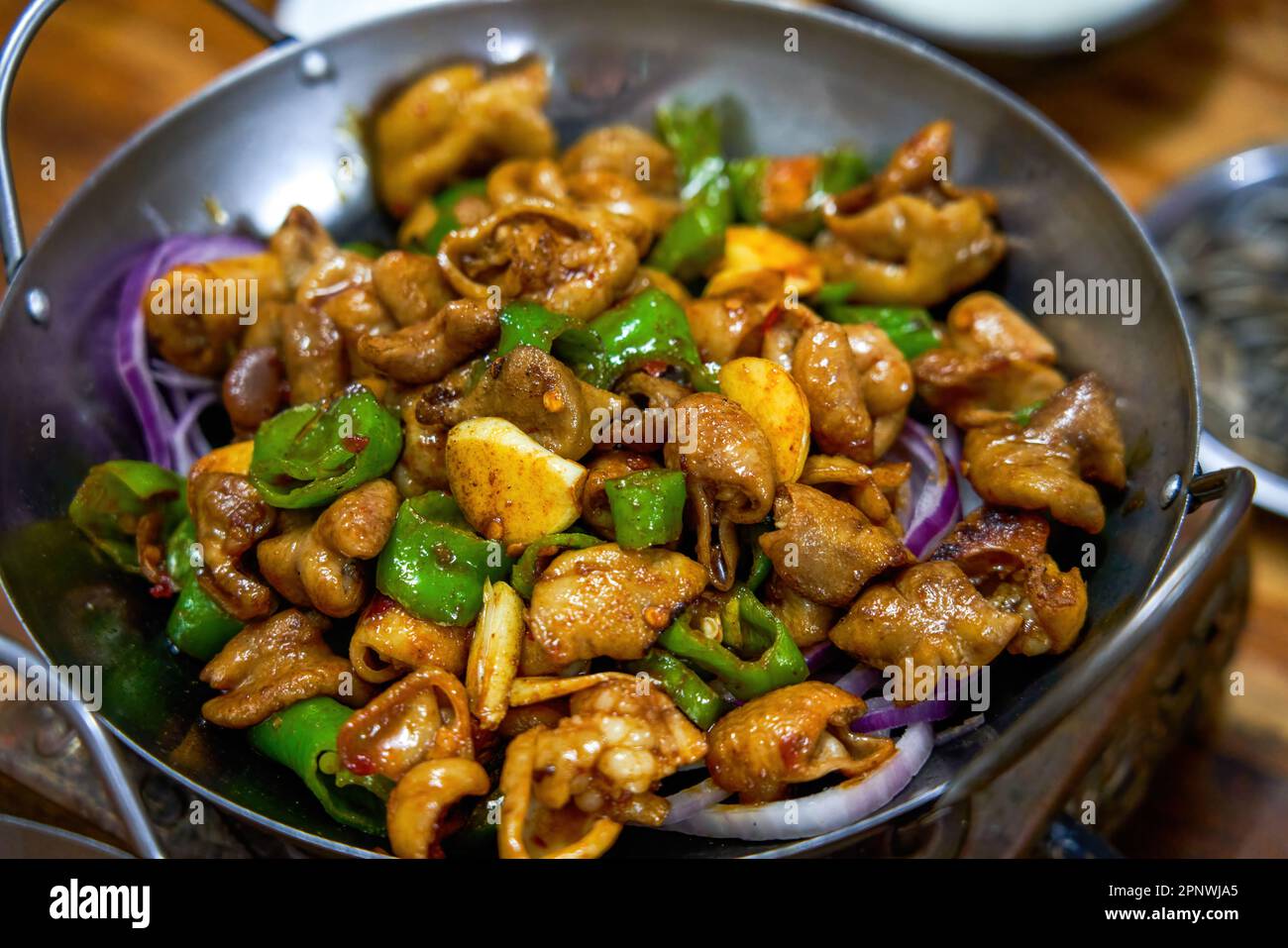 A spicy and delicious Hunan cuisine, deep-fried fat intestines Stock ...