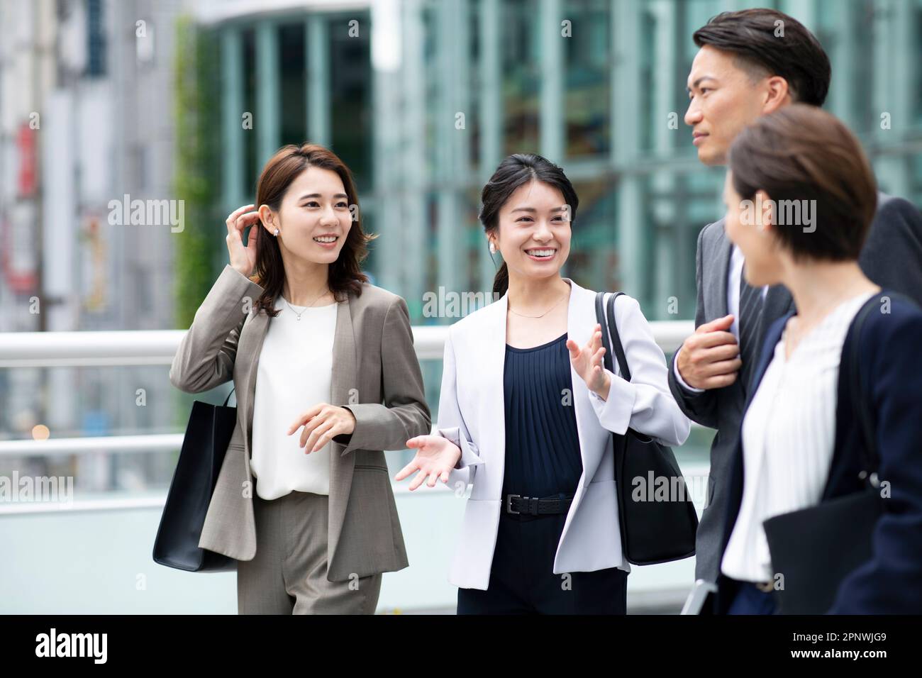 Businessman and businesswoman having a conversation Stock Photo - Alamy