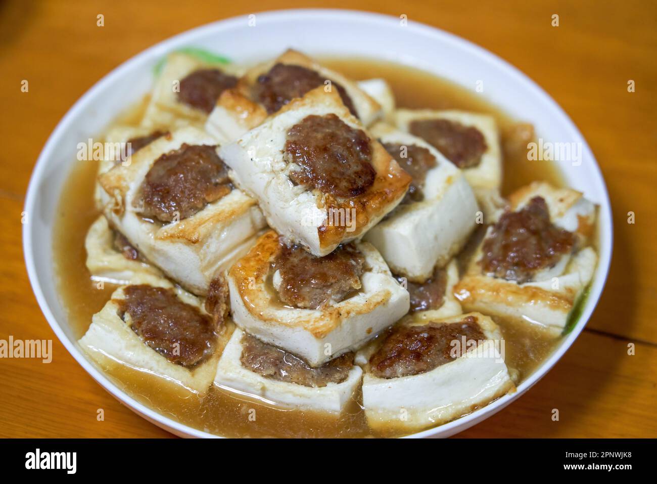 A delicious Chinese home cooking, fried tofu stuffed meat Stock Photo ...