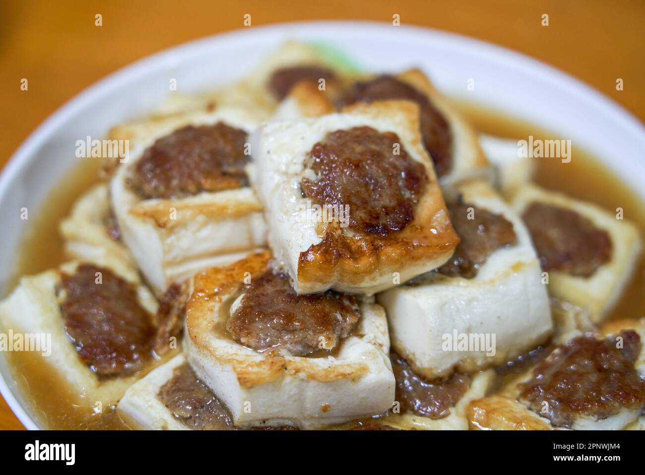 A delicious Chinese home cooking, fried tofu stuffed meat Stock Photo ...